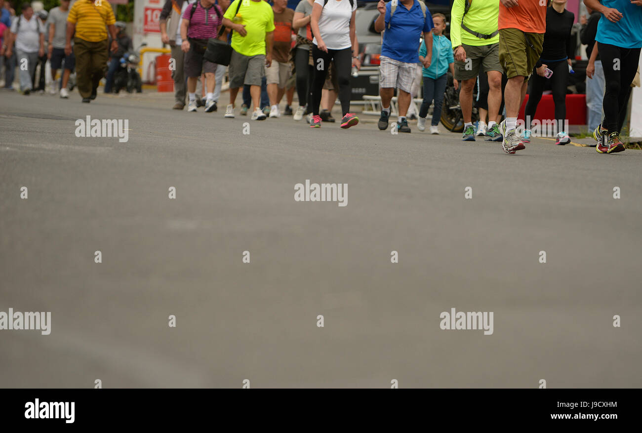 Pilgrims walk along the highway during the annual catholic pilgrimage ...