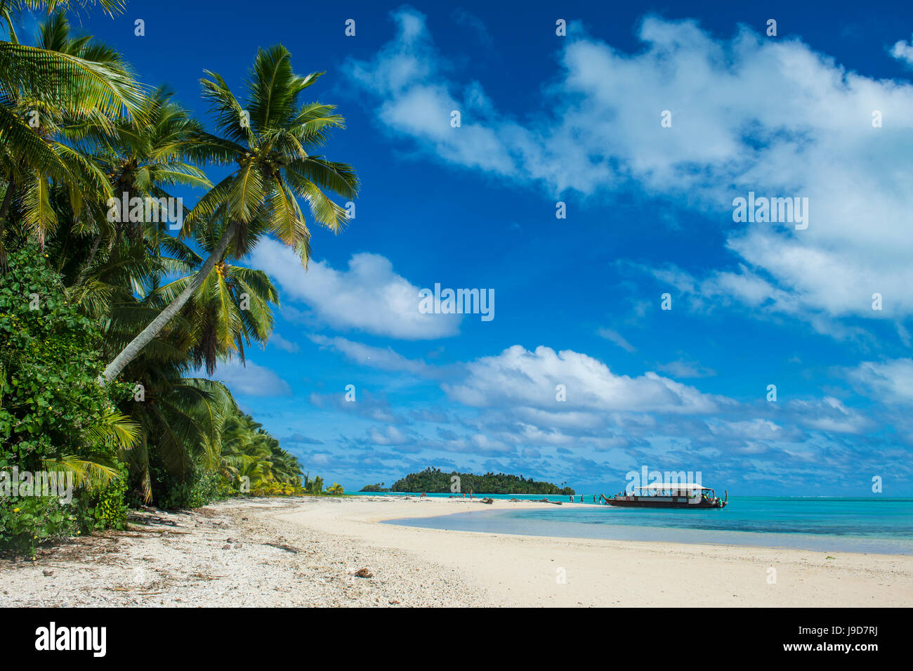 Traditional wood carved boat in the Aitutaki lagoon, Rarotonga and the ...