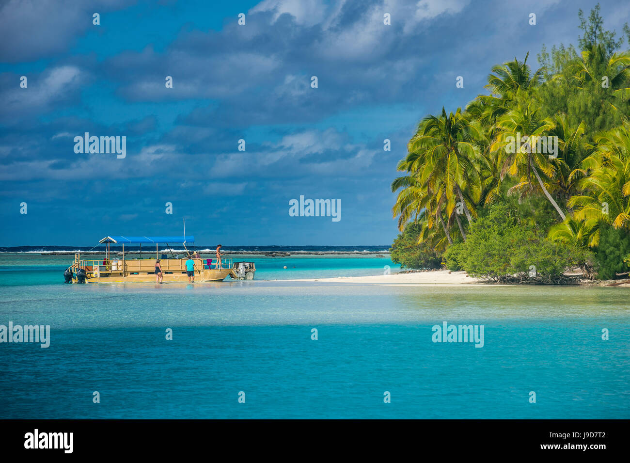 Traditional wood carved boat in the Aitutaki lagoon, Rarotonga and the ...