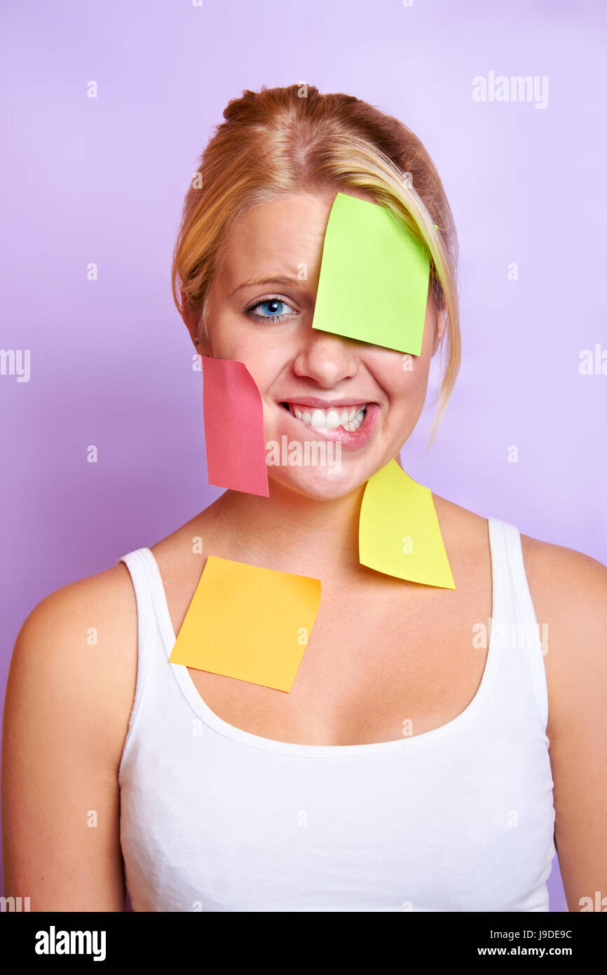 portrait of a pretty young woman with sticky notes Stock Photo - Alamy