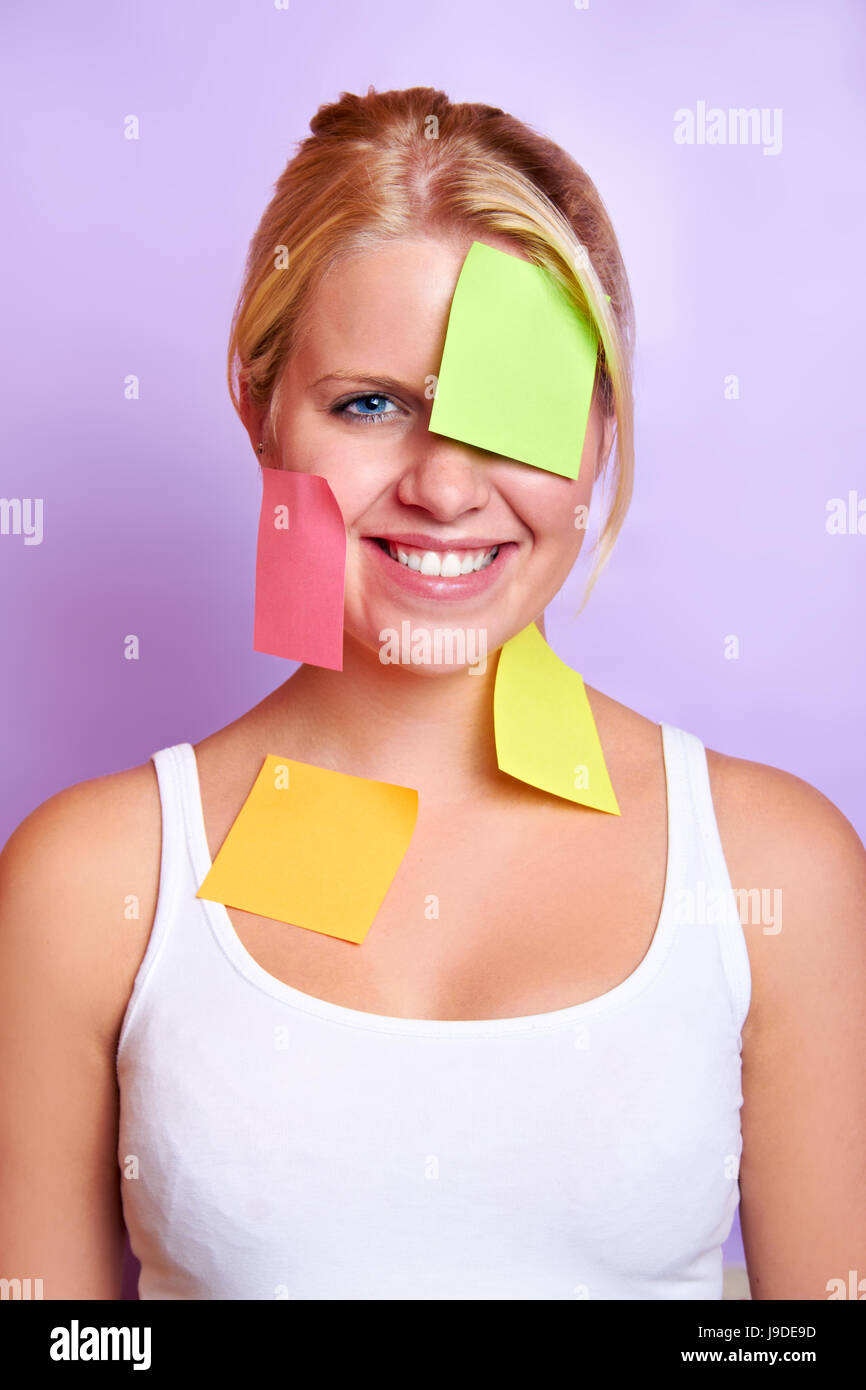 portrait of a pretty young woman with sticky notes Stock Photo - Alamy