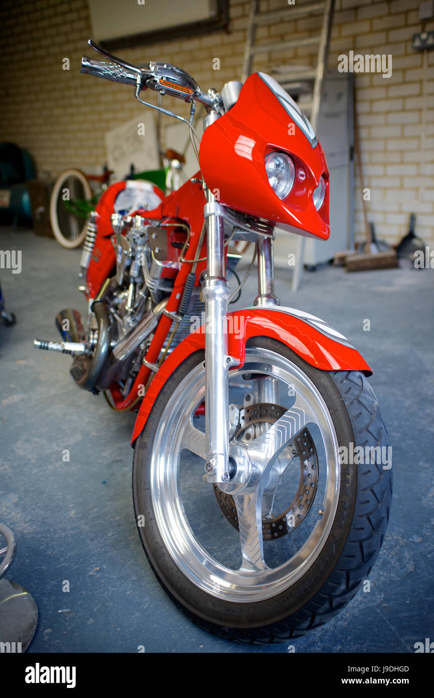 Custom built motorcycle in a workshop Stock Photo - Alamy