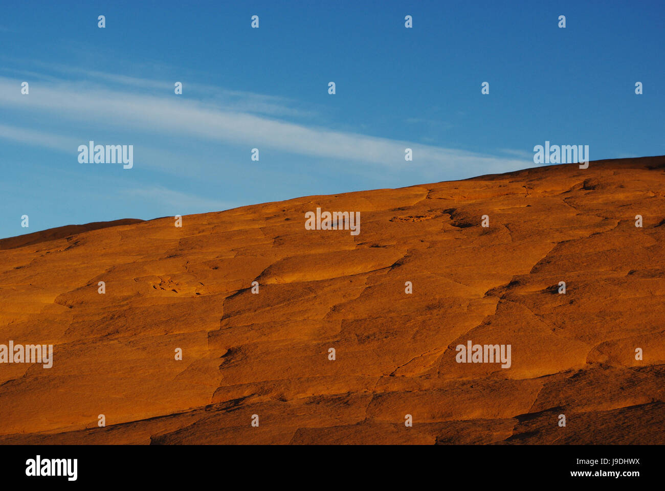 early morning light on orange rock plateau,devils garden,utah Stock ...