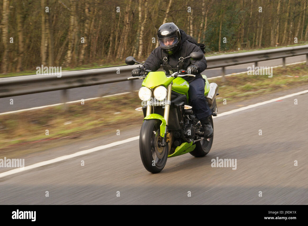 Triumph Street Triple Motorcycle on the road Stock Photo - Alamy