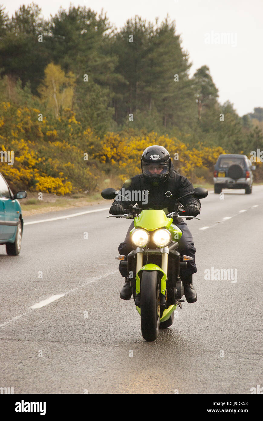 Triumph Street Triple Motorcycle on the road Stock Photo - Alamy