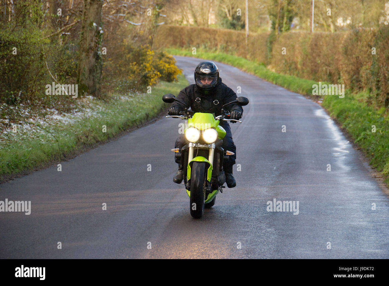 Triumph Street Triple Motorcycle on the road Stock Photo - Alamy