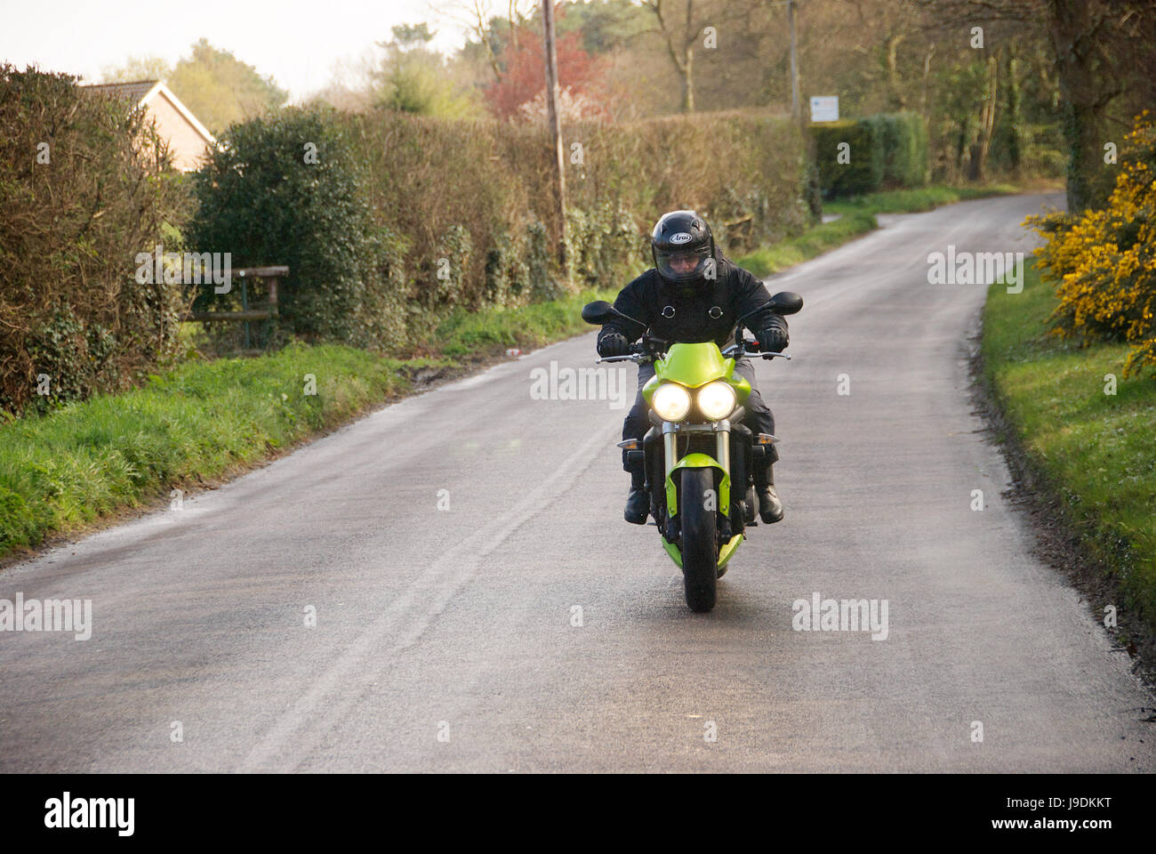 Triumph Street Triple Motorcycle on the road Stock Photo - Alamy