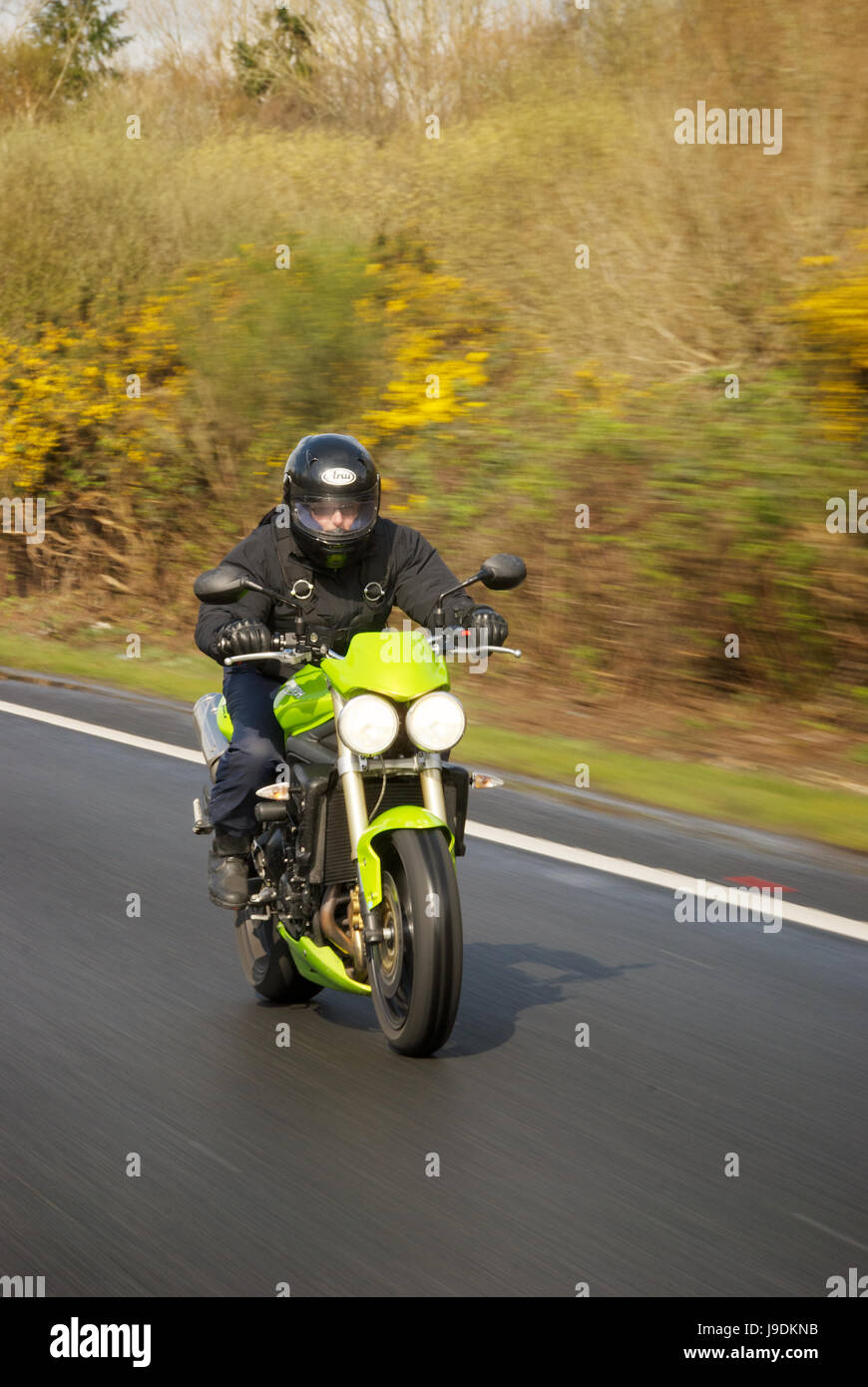 Triumph Street Triple Motorcycle on the road Stock Photo - Alamy