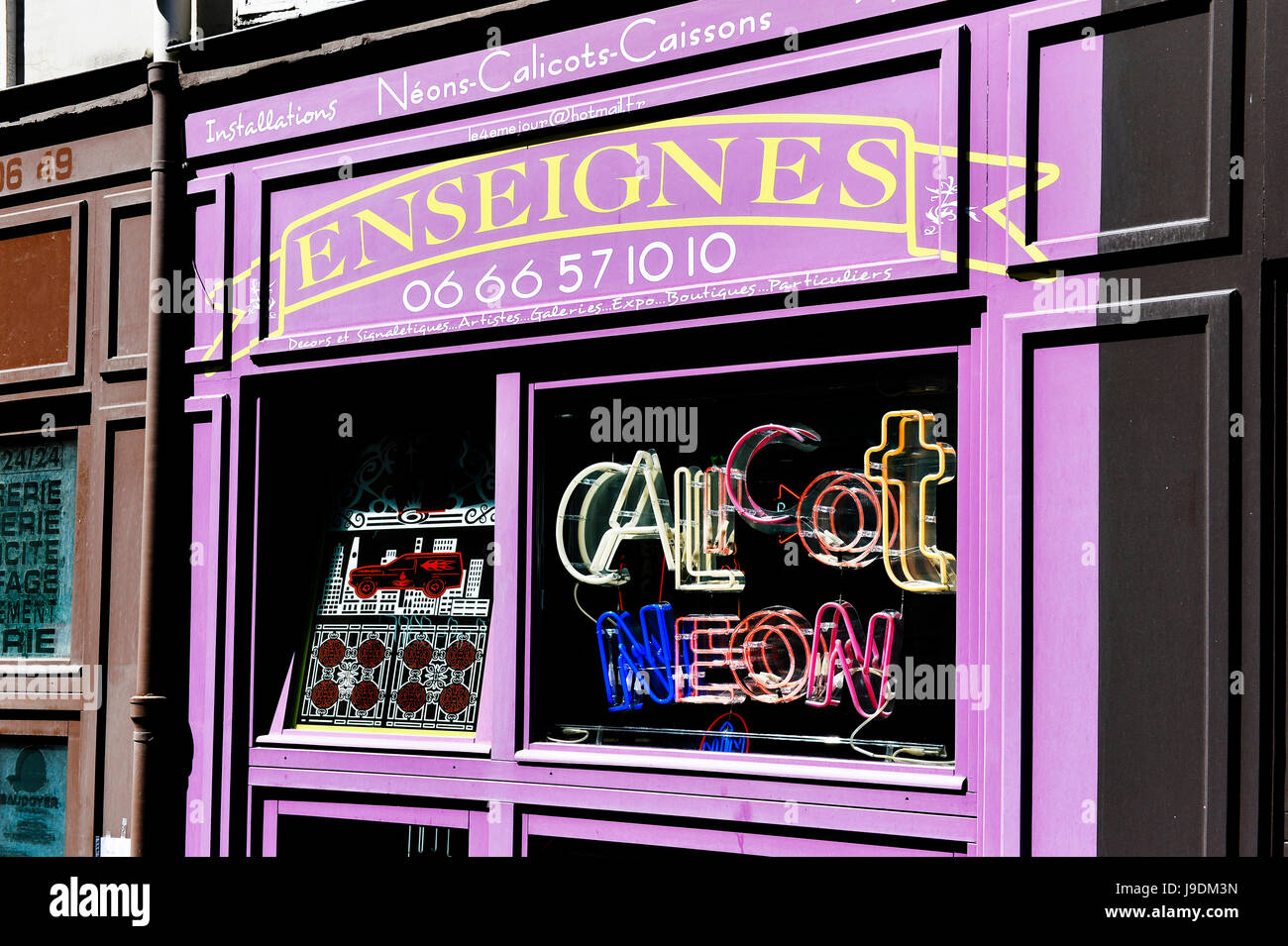 Signs and Neon shop, Paris, France Stock Photo - Alamy