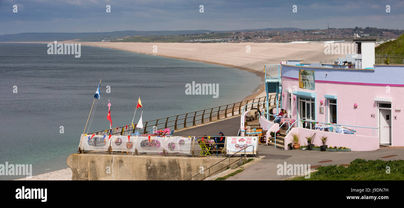 UK England, Dorset, Portland, Chiswell Cove, customers outside Quiddles ...