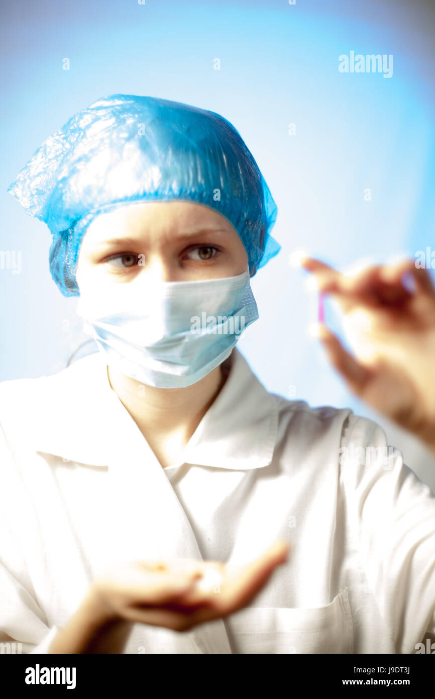 Nurse with pills in hand in hospital Stock Photo - Alamy