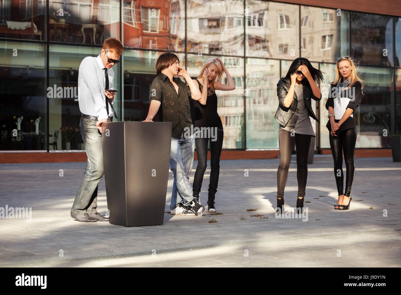 Young people calling on the cell phones Stock Photo - Alamy