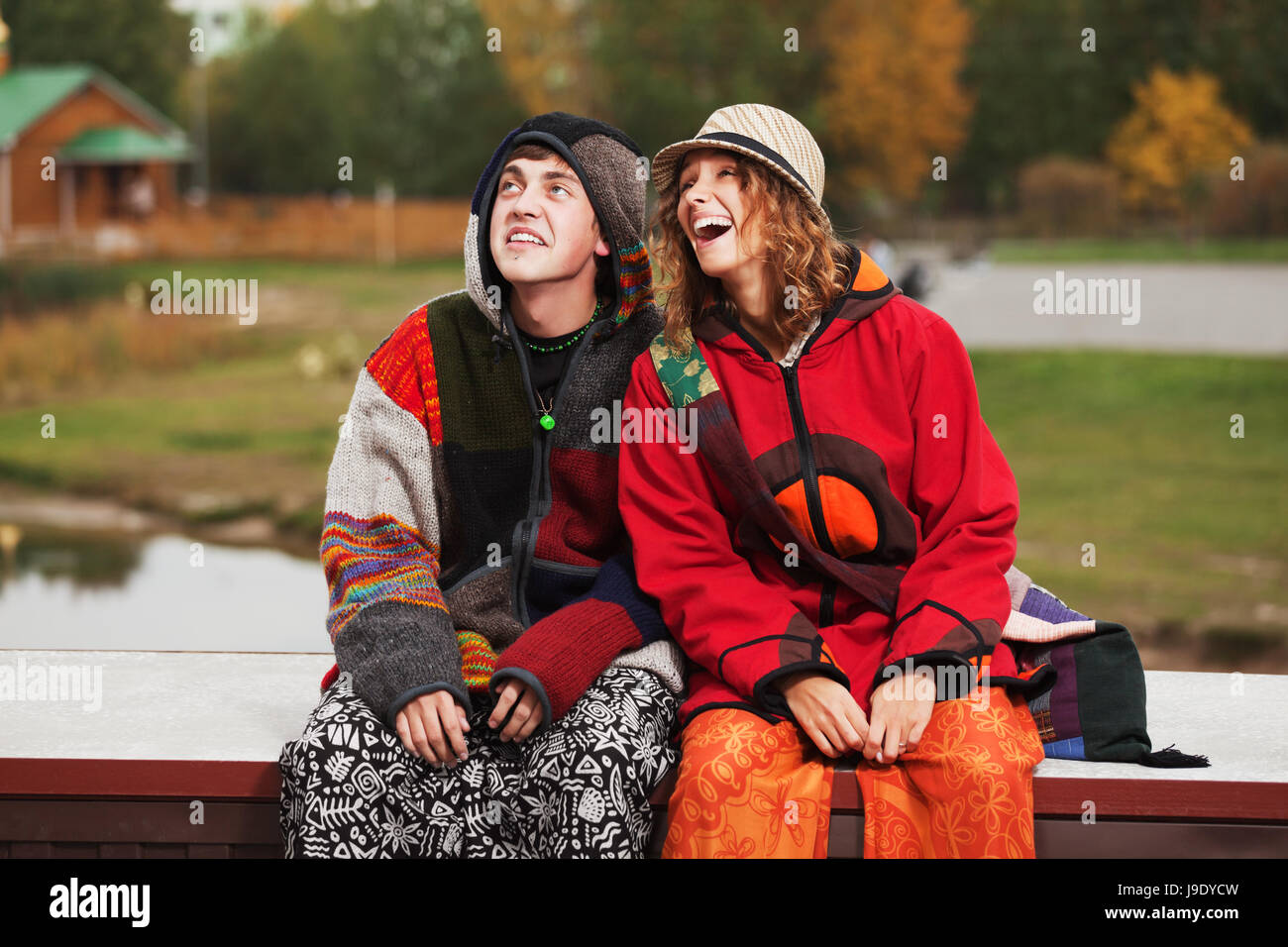 Young hippie couple in autumn park Stock Photo - Alamy