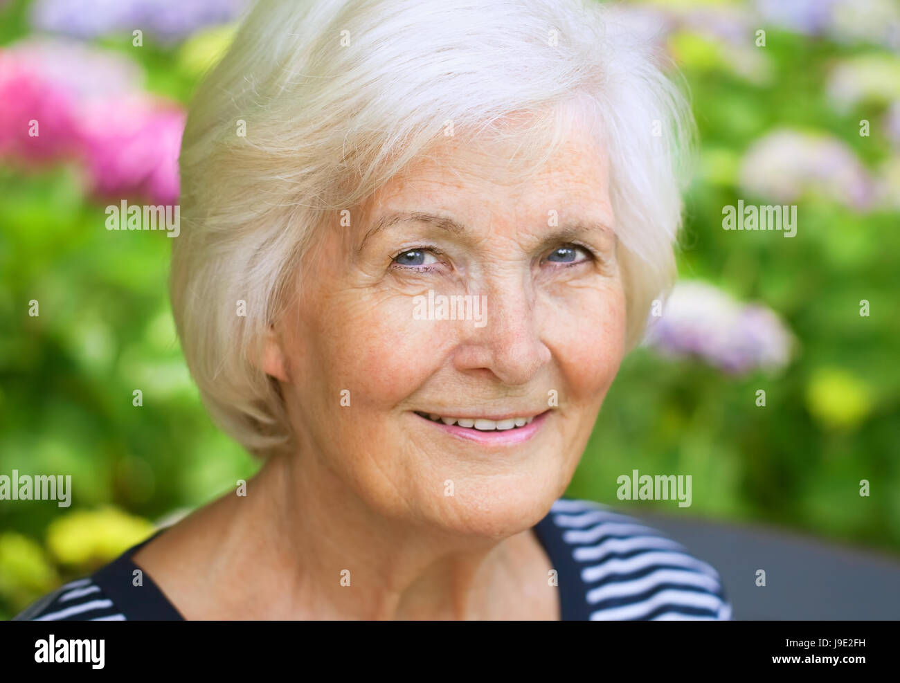 seniors portrait against floral background Stock Photo - Alamy