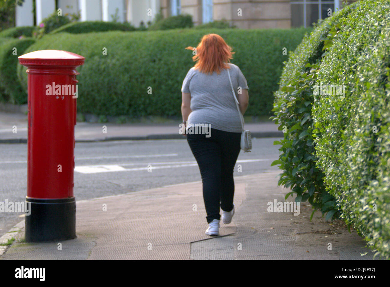 Obese fat female walking hi-res stock photography and images - Alamy