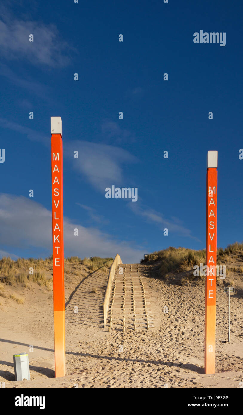 Orange coloured poles near the entrance to the Maasvlakte beach on the ...