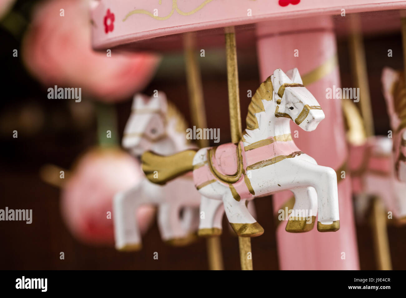 Wooden carousel horses with old vintage look on marble background Stock ...