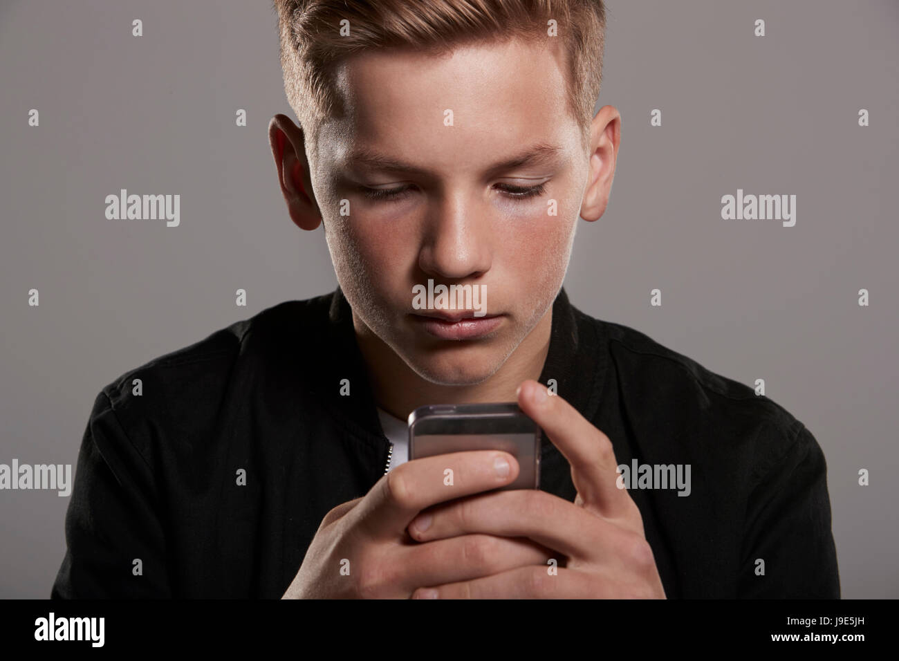 14 year old boy phone hi-res stock photography and images - Alamy