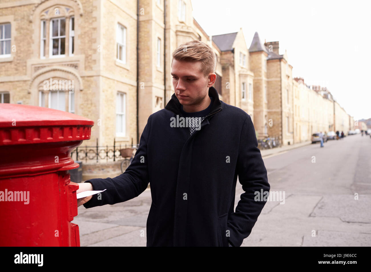 Man Posting Letter In Red British Postbox Stock Photo - Alamy Man Posting Letter In Red British Postbox Stock Photo - Alamy