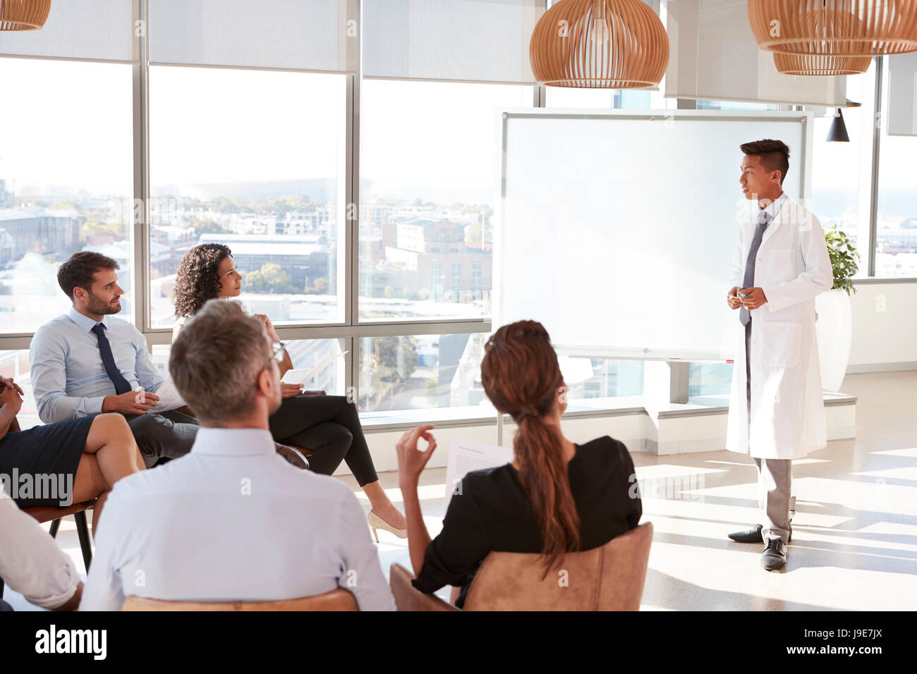 Doctor Making Presentation To Medical Staff In Hospital Stock Photo - Alamy