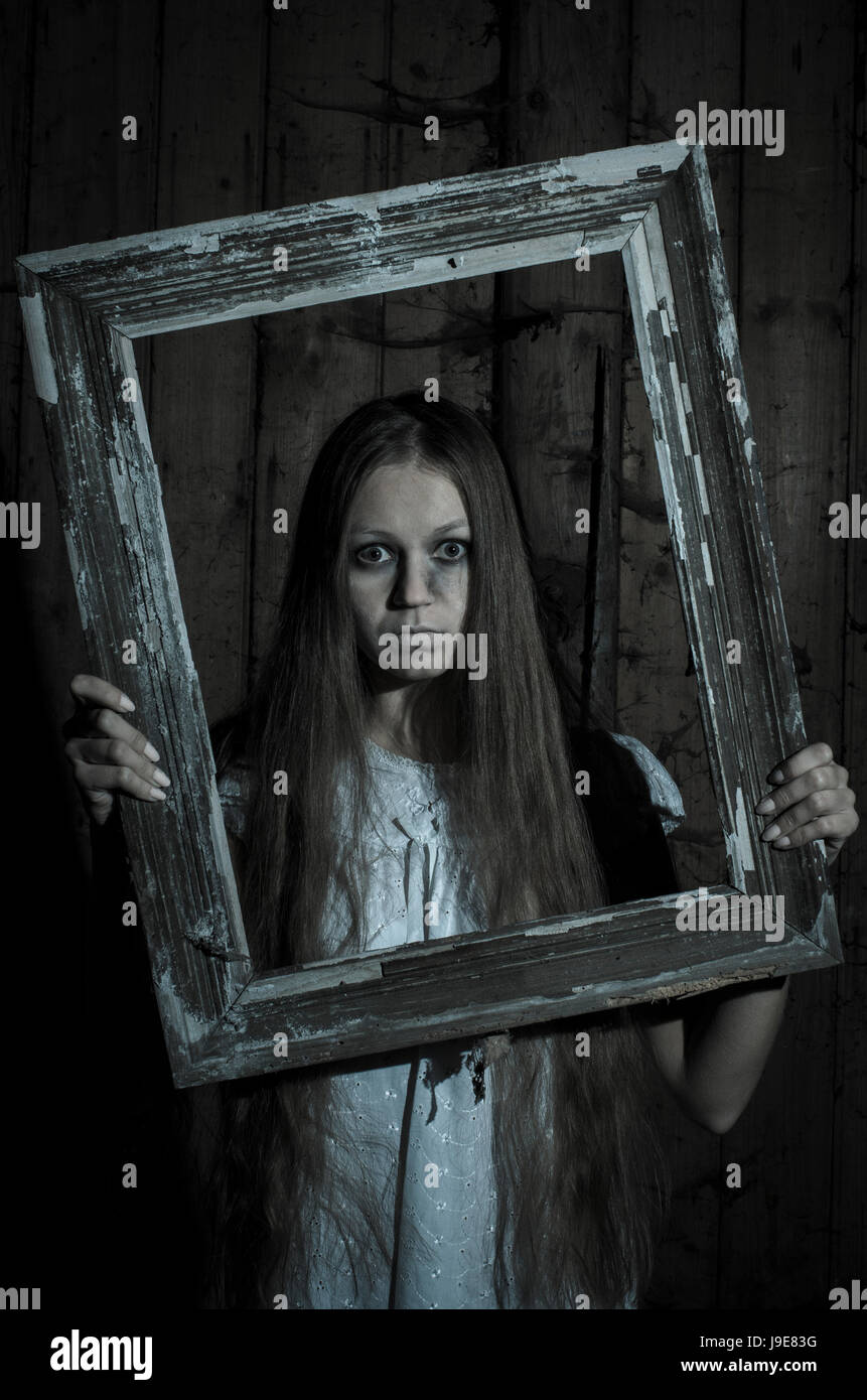 Horror girl in white dress Stock Photo - Alamy