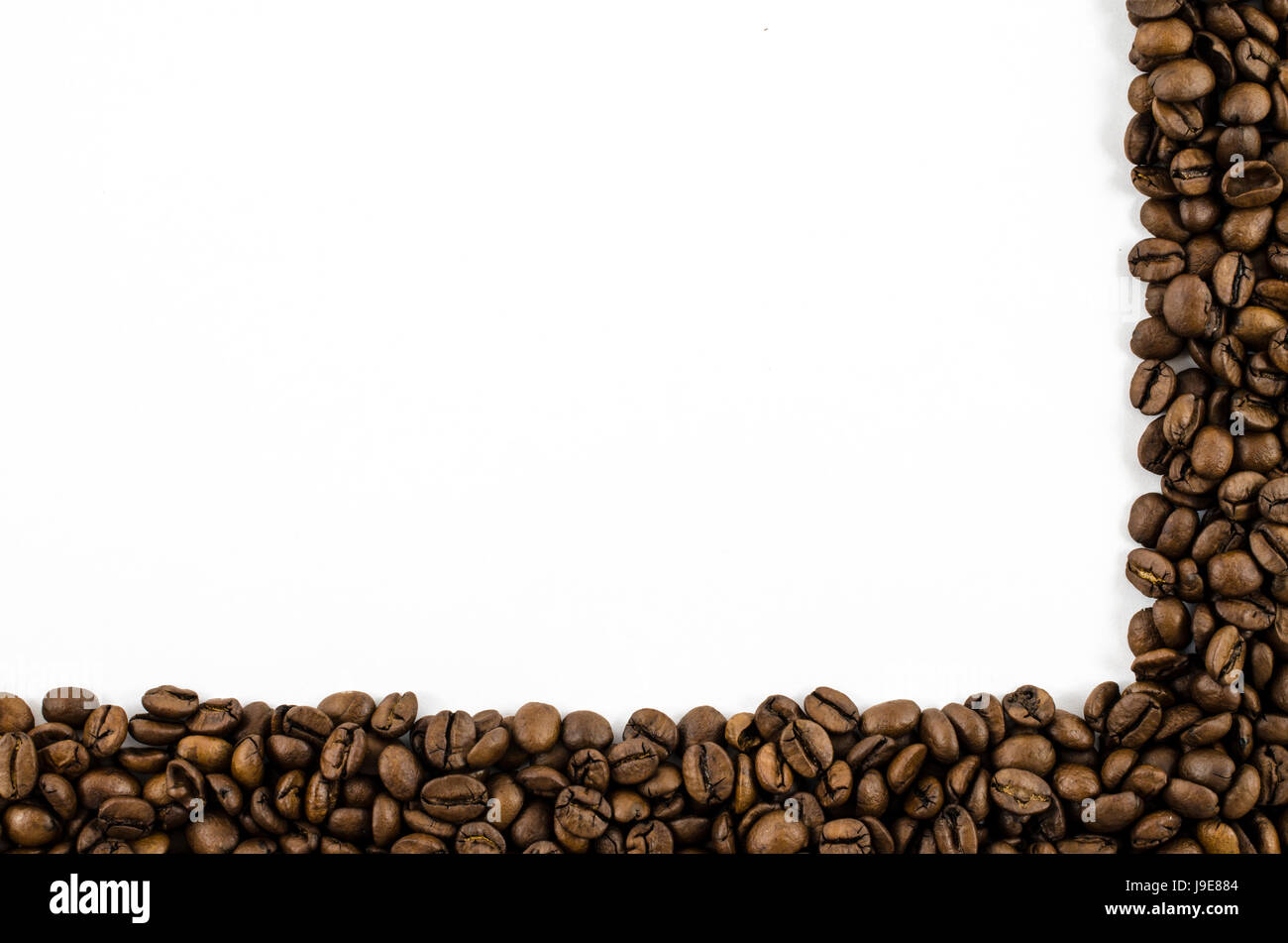 Frame of coffee beans on white background Stock Photo - Alamy