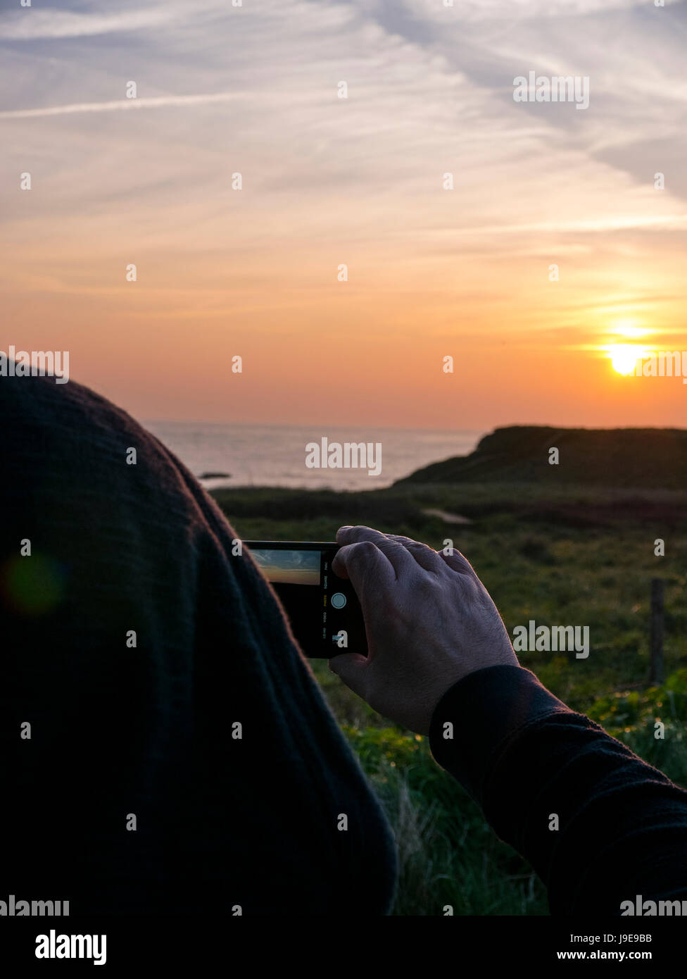 Back view man taking photograph hi-res stock photography and images - Alamy