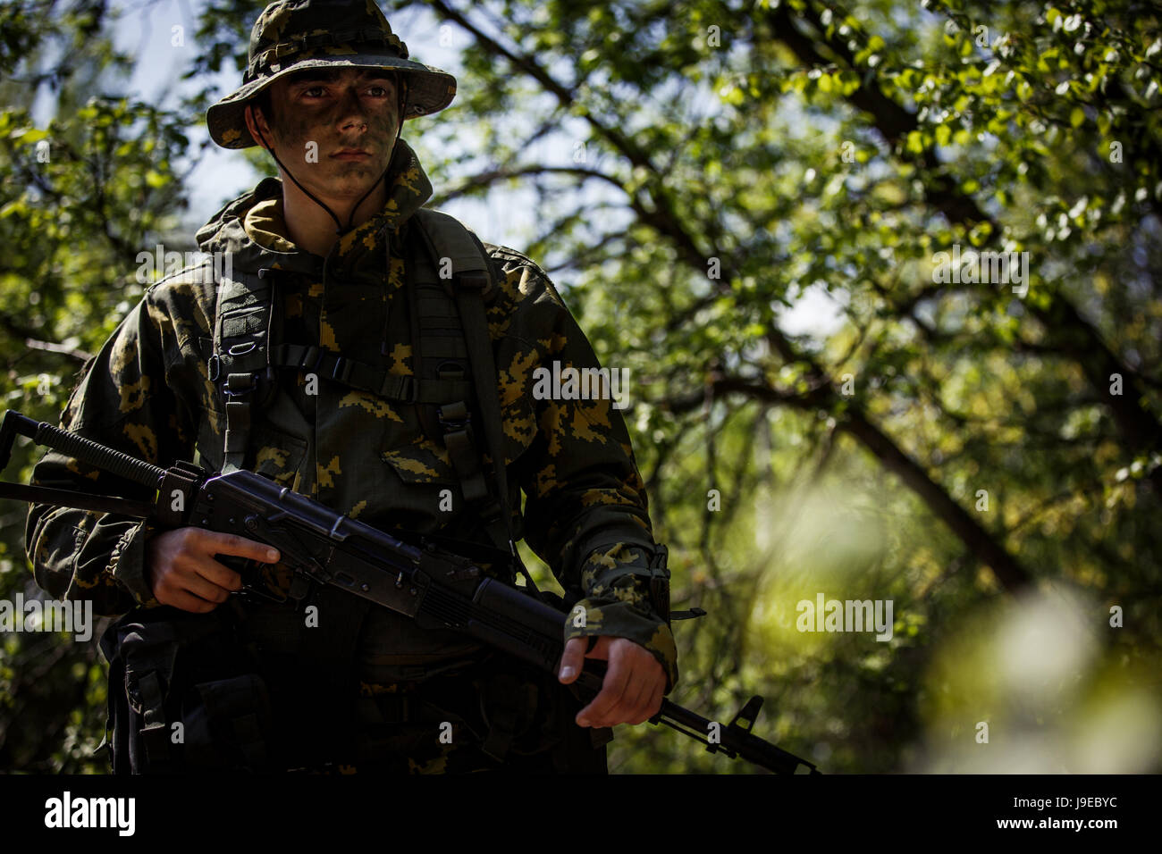 Portrait of soldier in uniforms Stock Photo - Alamy