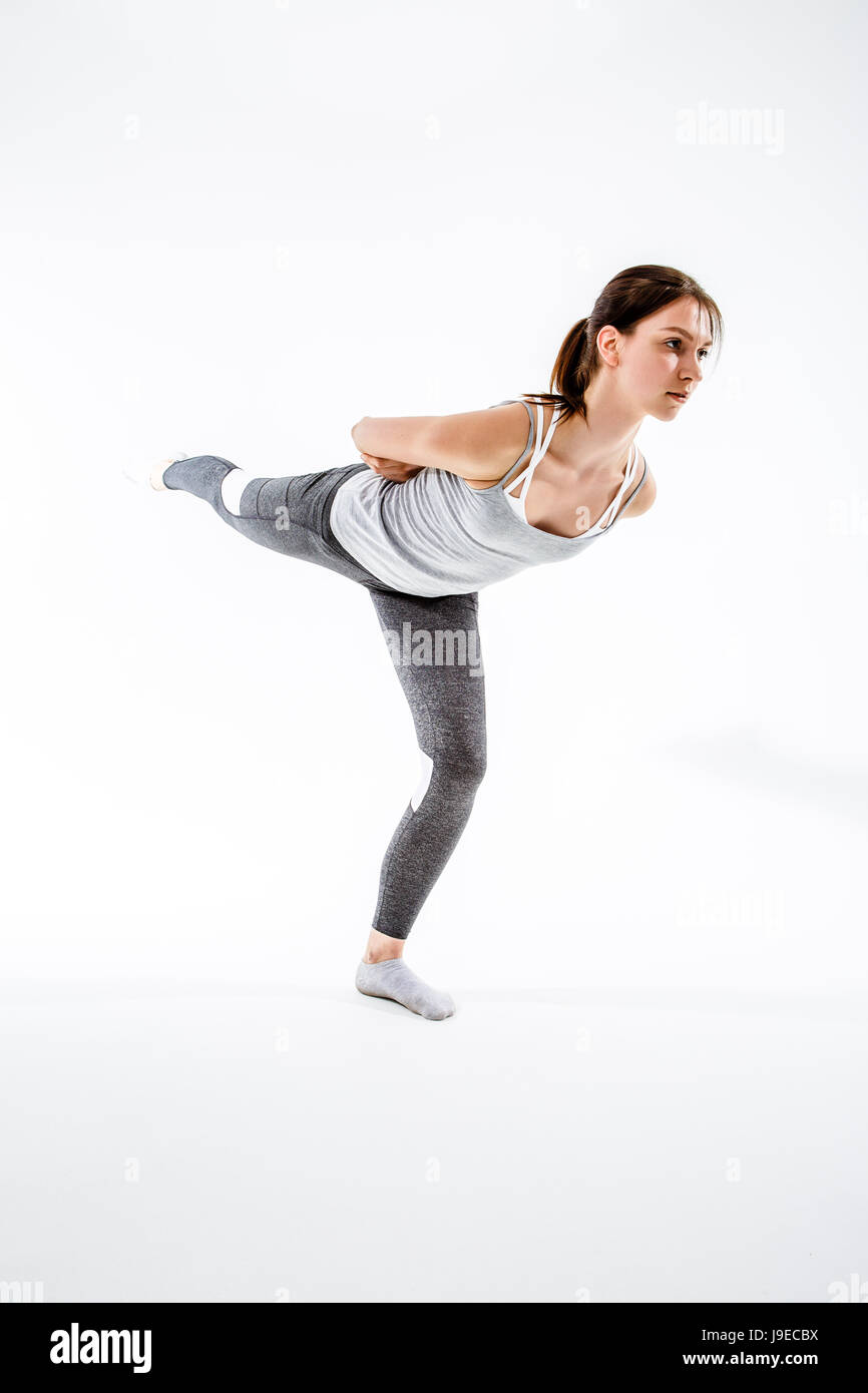 Athlete balances on one leg Stock Photo - Alamy