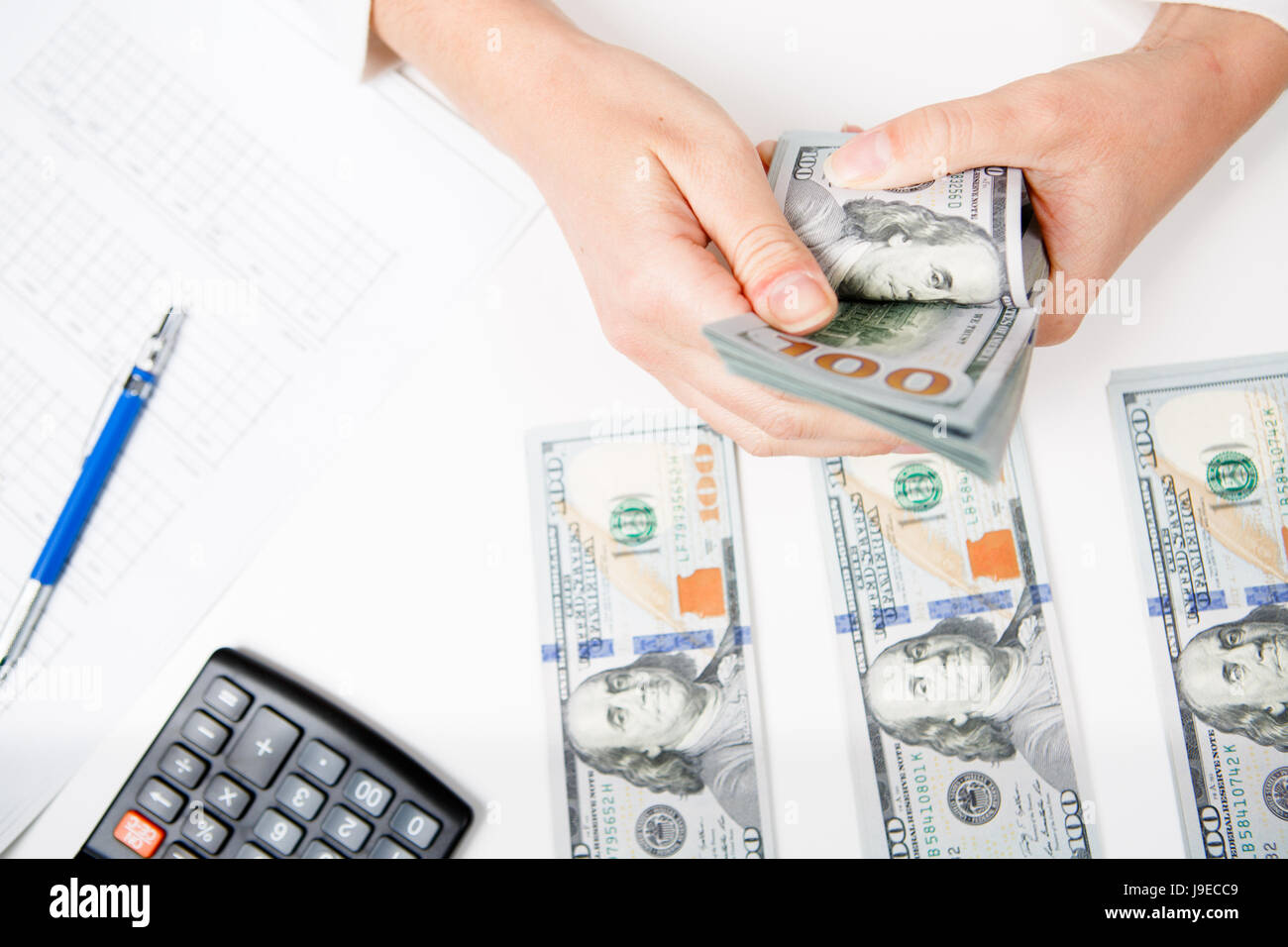 Hands counting money, close up Stock Photo - Alamy