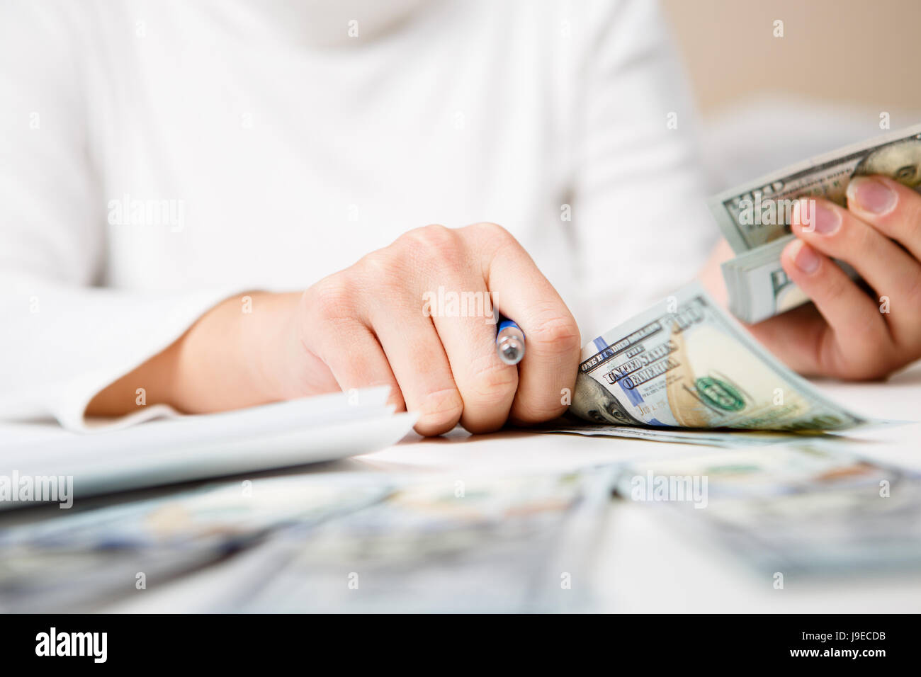 Hands counting money, close up Stock Photo - Alamy