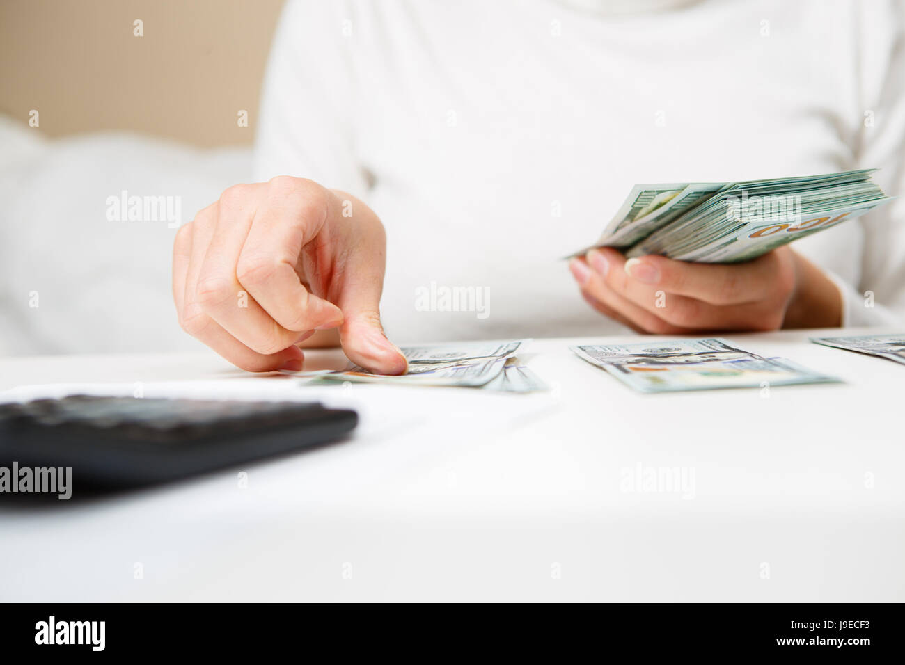 Hands counting money, close up Stock Photo - Alamy