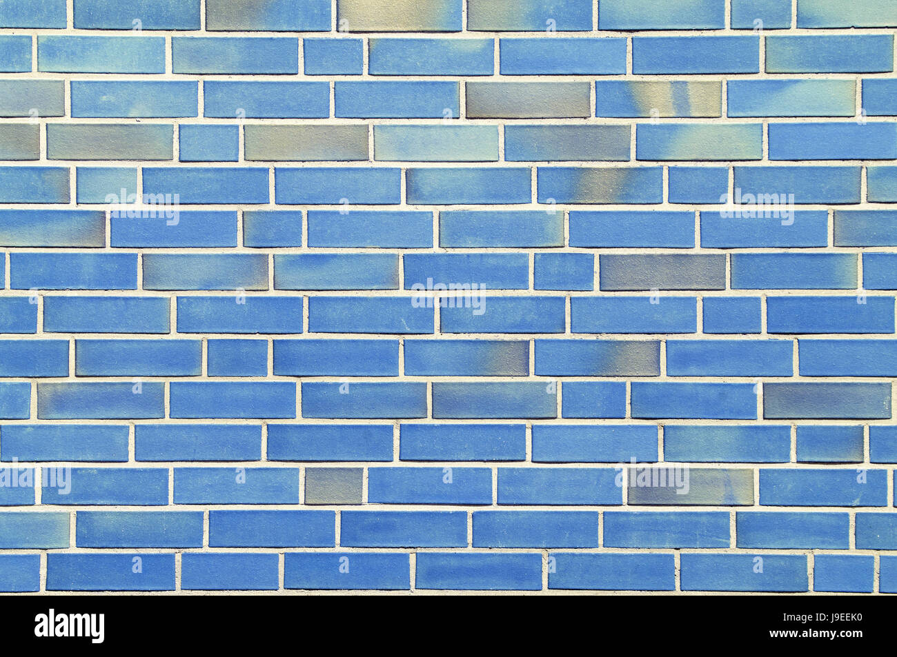 wall with blue bricks Stock Photo - Alamy