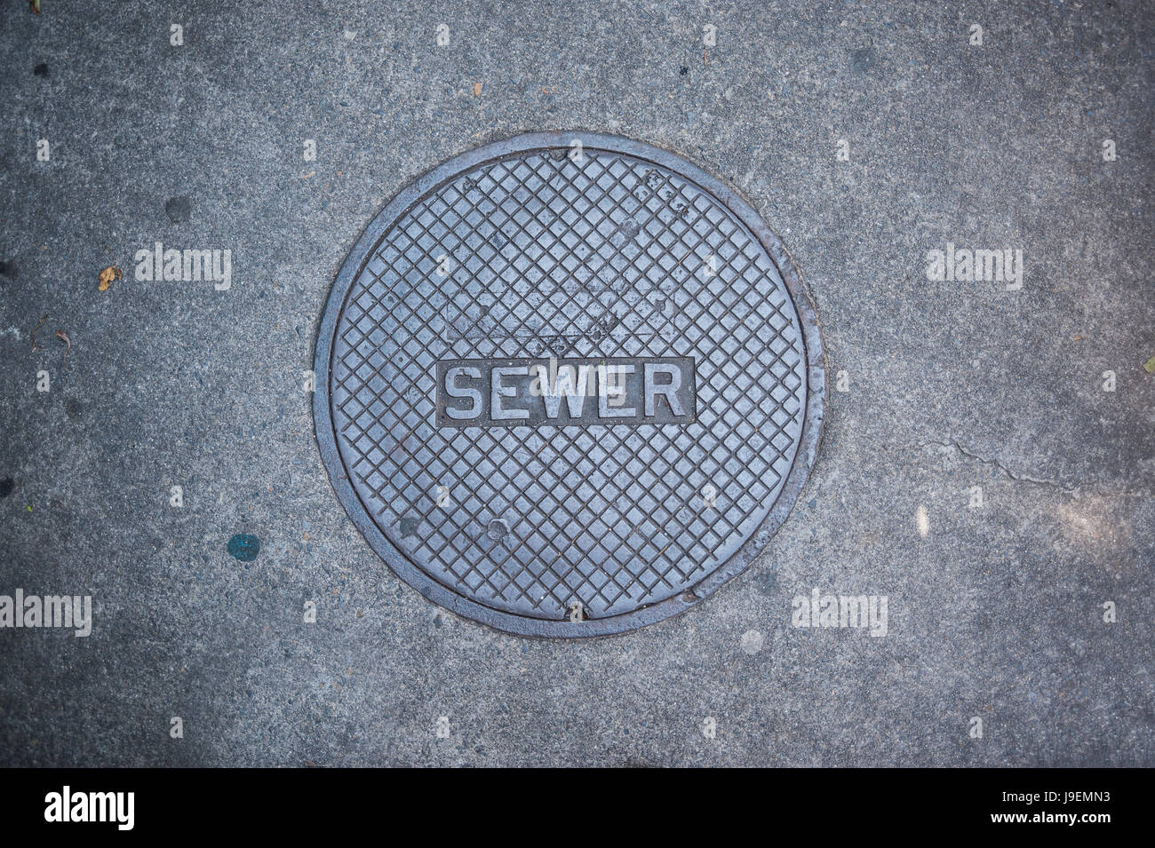 Street water valve cover hi-res stock photography and images - Alamy