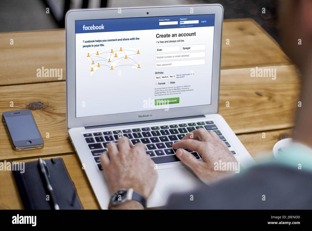 Facebook laptop man hi-res stock photography and images - Alamy
