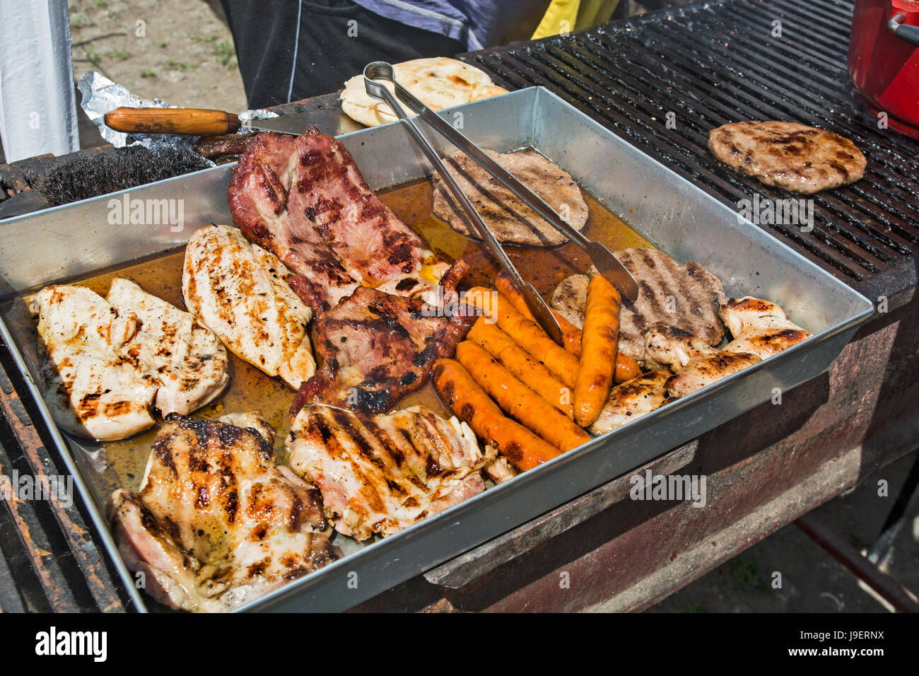 Freshly prepared and grilled meats roasted on offer to customers Stock ...