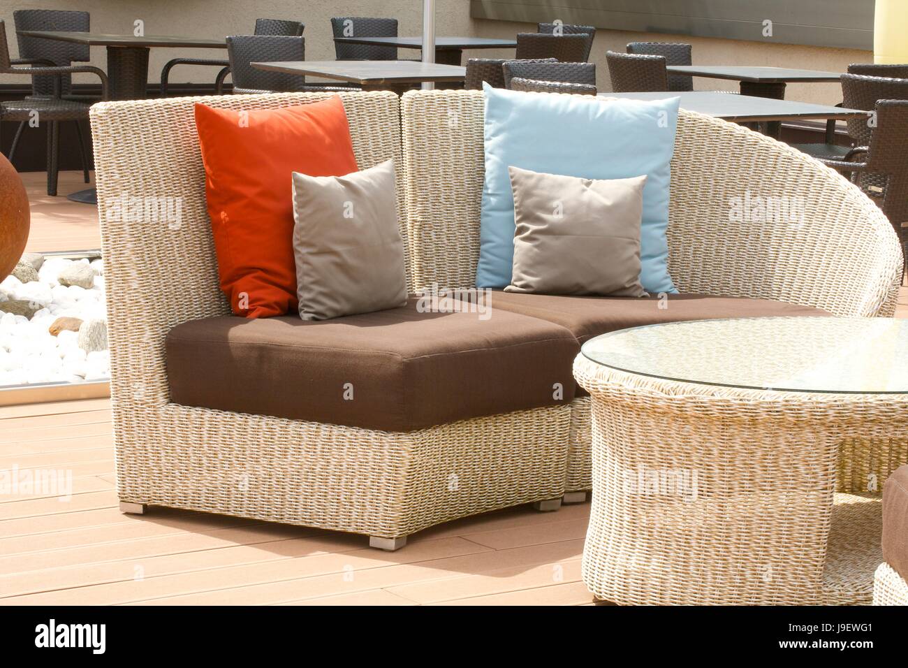 Exterior hotel furniture on a terrace Stock Photo - Alamy