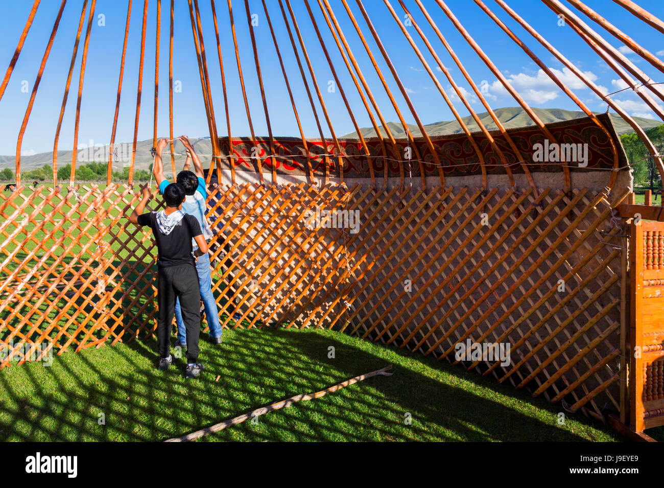 Kazakh men putting up a yurt, For editorial Use only, Sati village ...