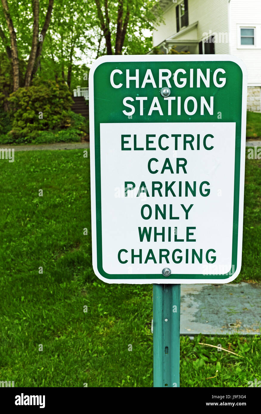 Charging station sign indicating parking for electric cars only and ...