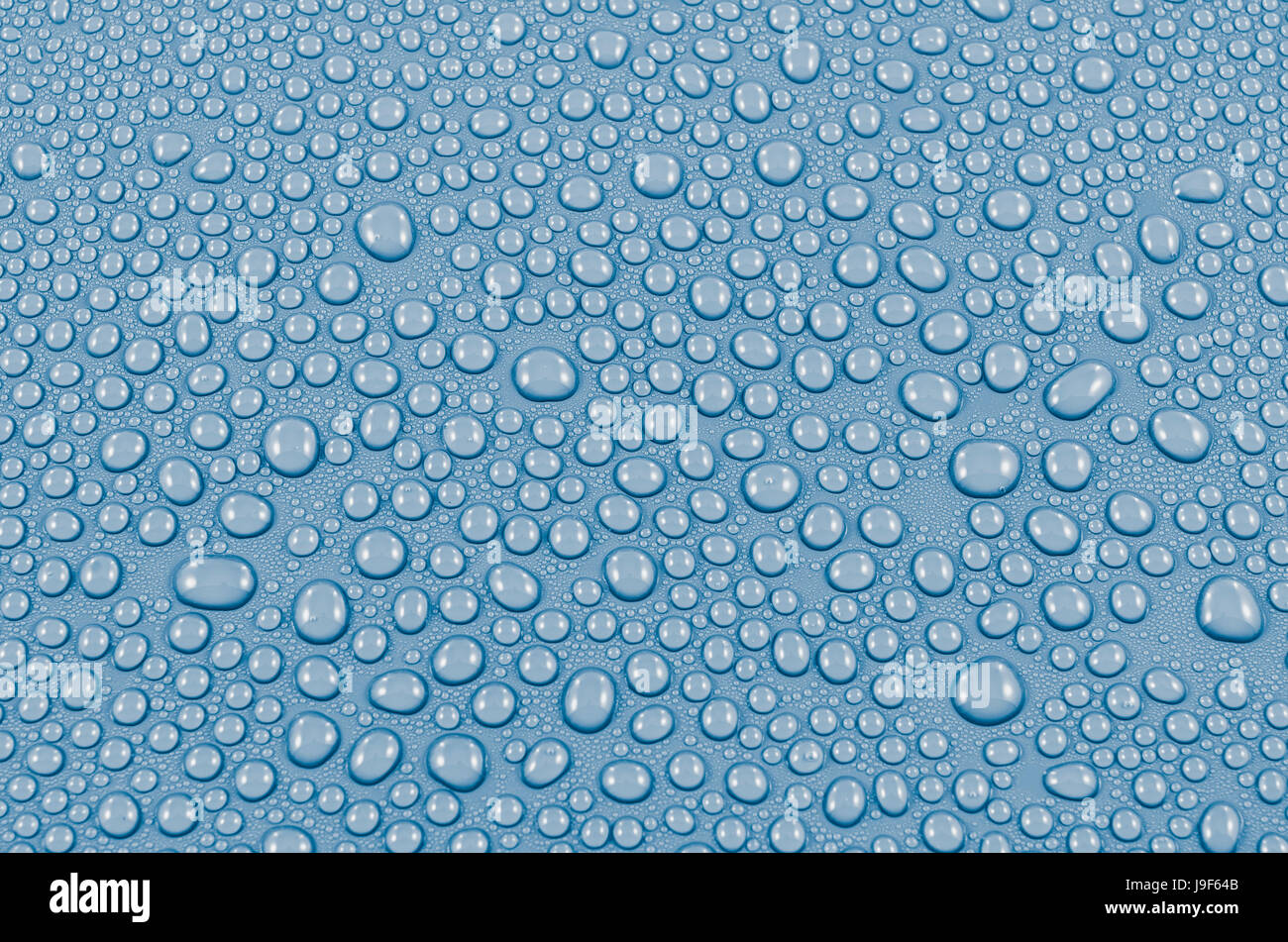 Blue water drops background Stock Photo - Alamy