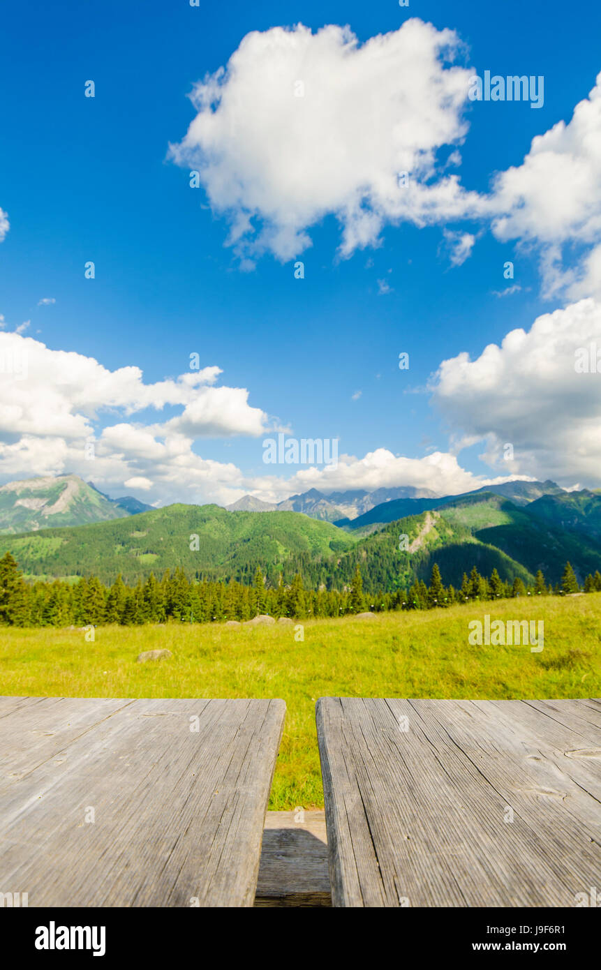 Empty table with landscape background Stock Photo - Alamy