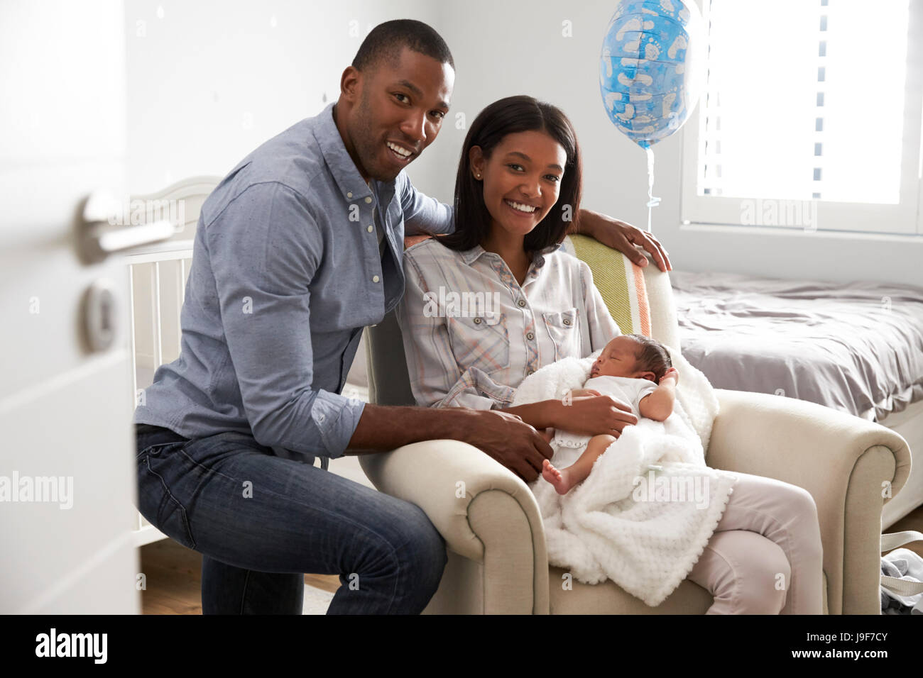 Portrait Of Parents Home from Hospital With Newborn Baby Stock Photo ...