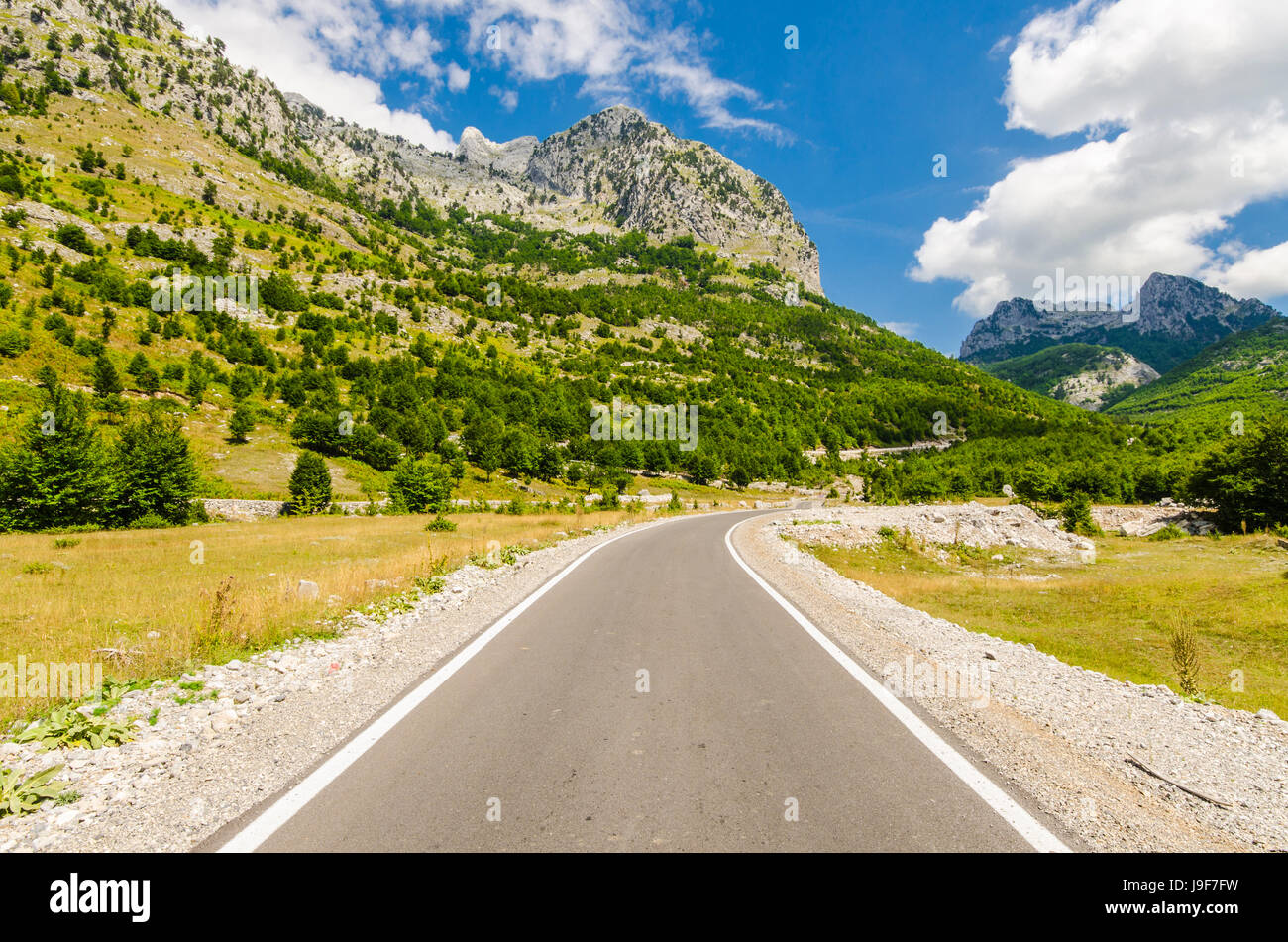Empty road to Theth village in Albanian mountains Stock Photo - Alamy