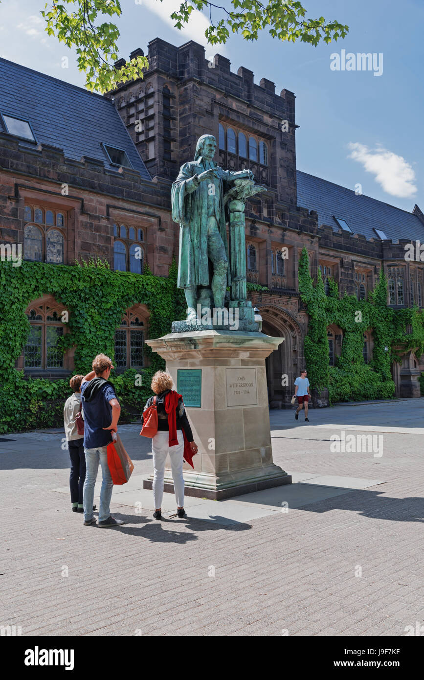 Tourists on Campus in Front of East Pyne Hall and Statue of John ...