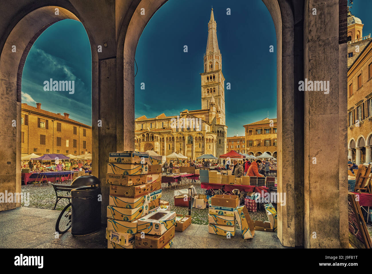 stalls of antique market in the main square of Modena in Italy Stock ...