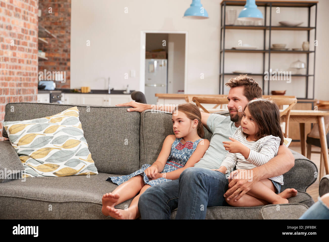 Father watching tv kitchen hi-res stock photography and images - Alamy