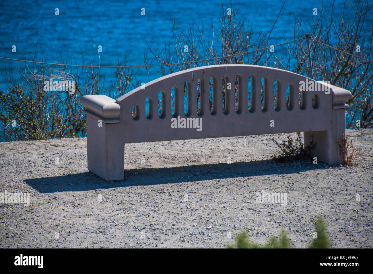 Bench by the sea Stock Photo - Alamy