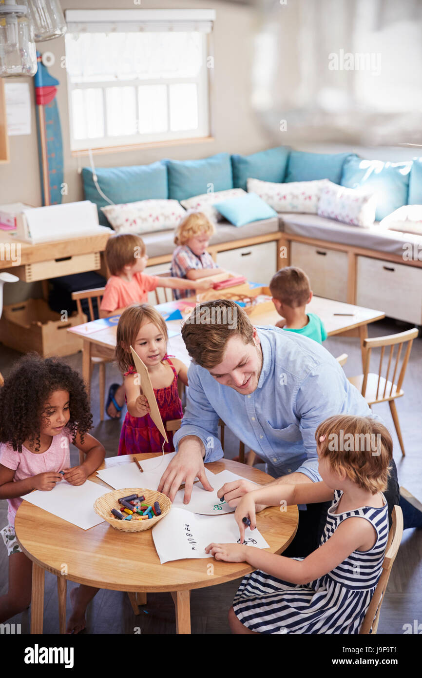 Teacher writing class preschool hi-res stock photography and images - Alamy
