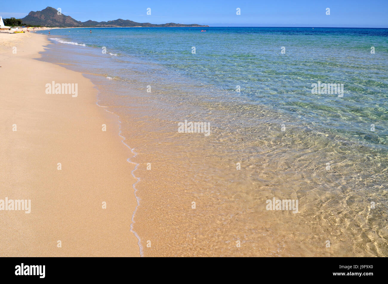 Transparent water of Mediterranean sea on Costa Rei beach on Sardinia ...