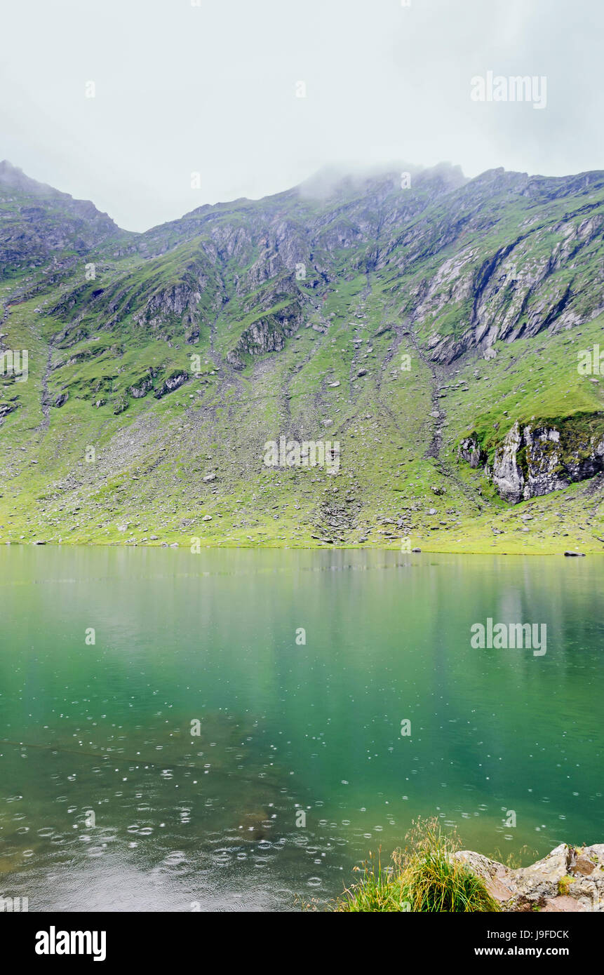 Balea Lake glacier lake situated at 2034m altitude in the Fagaras ...